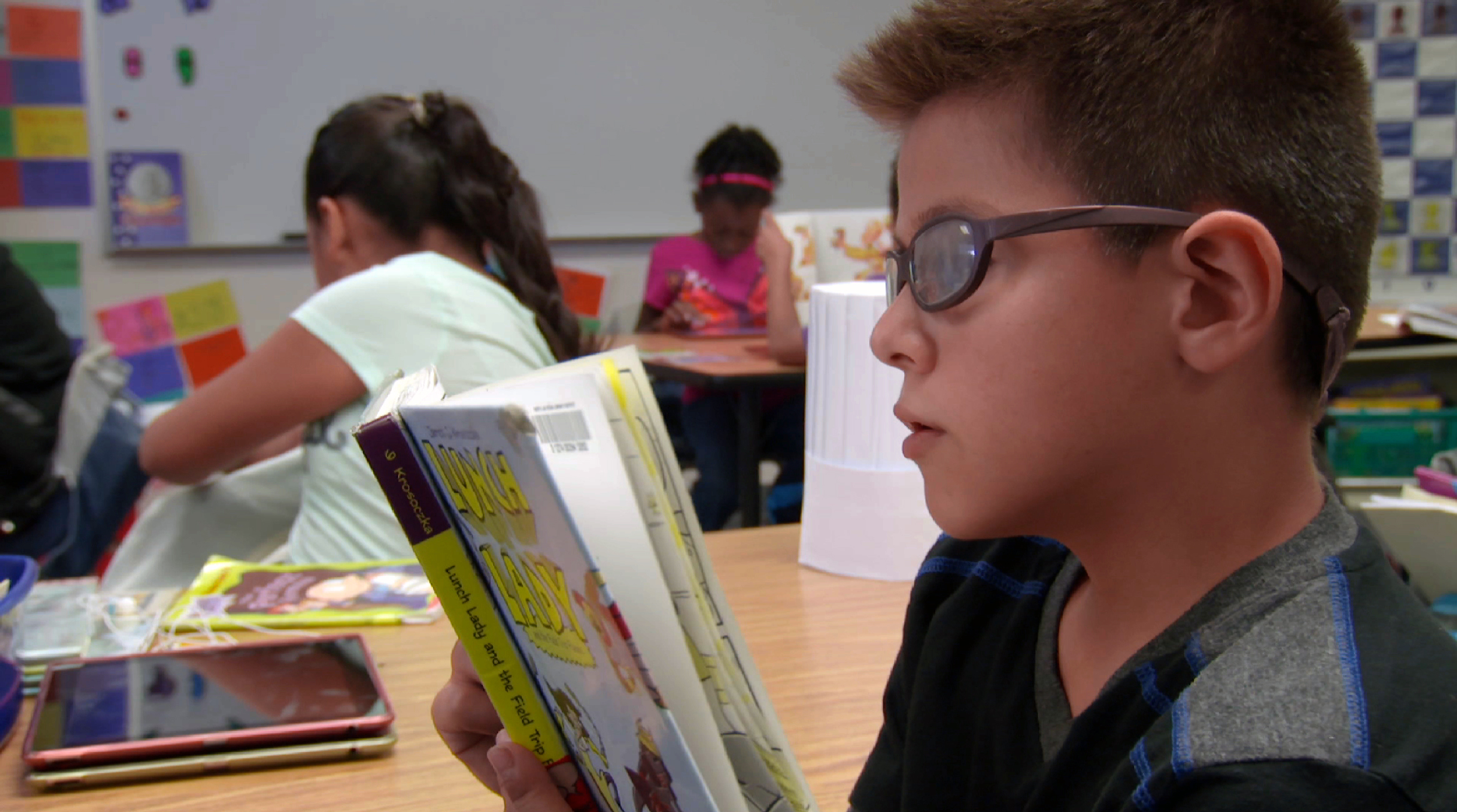 Middle School Students Reading Books