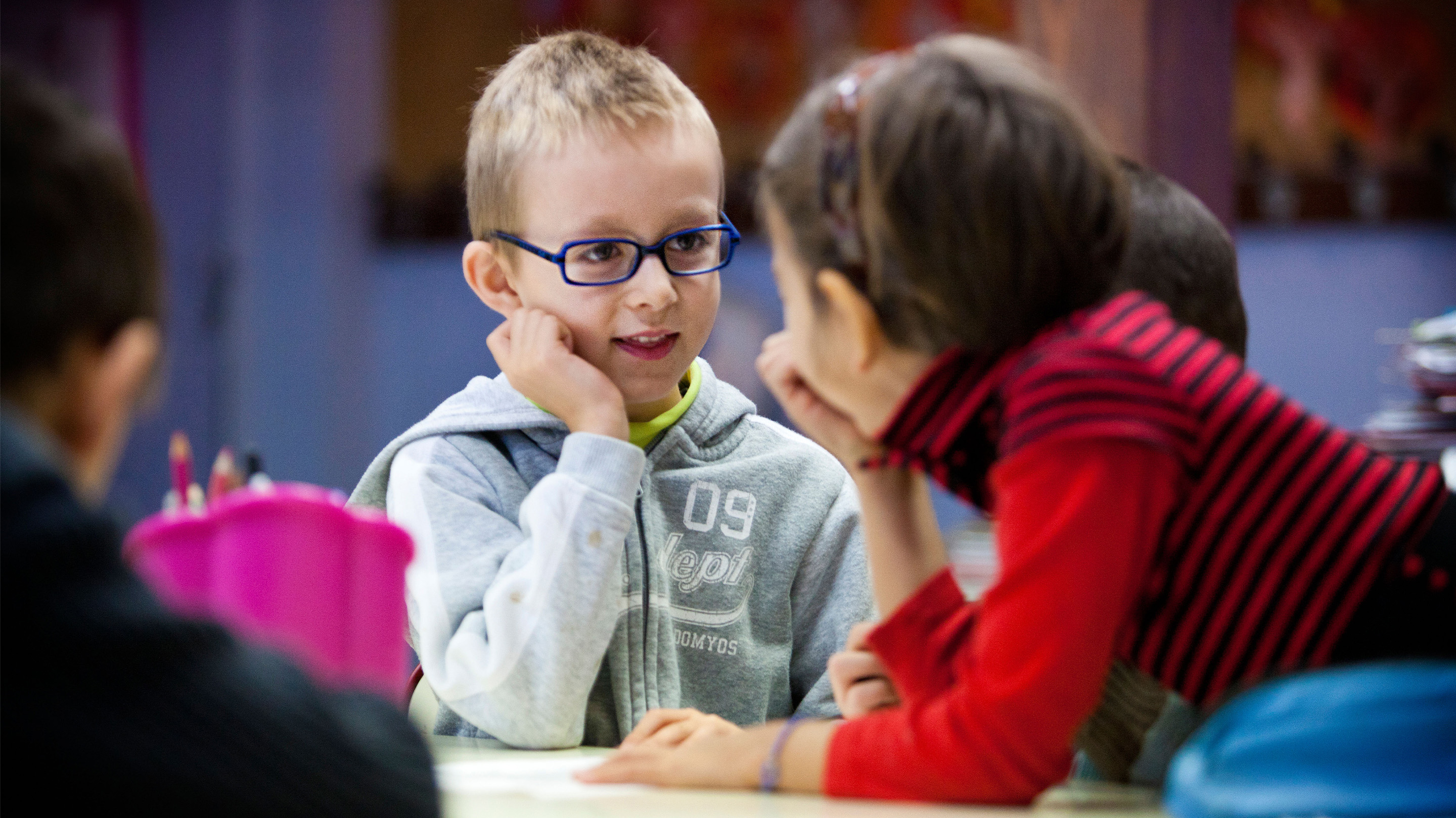 Young Students Talking In Class